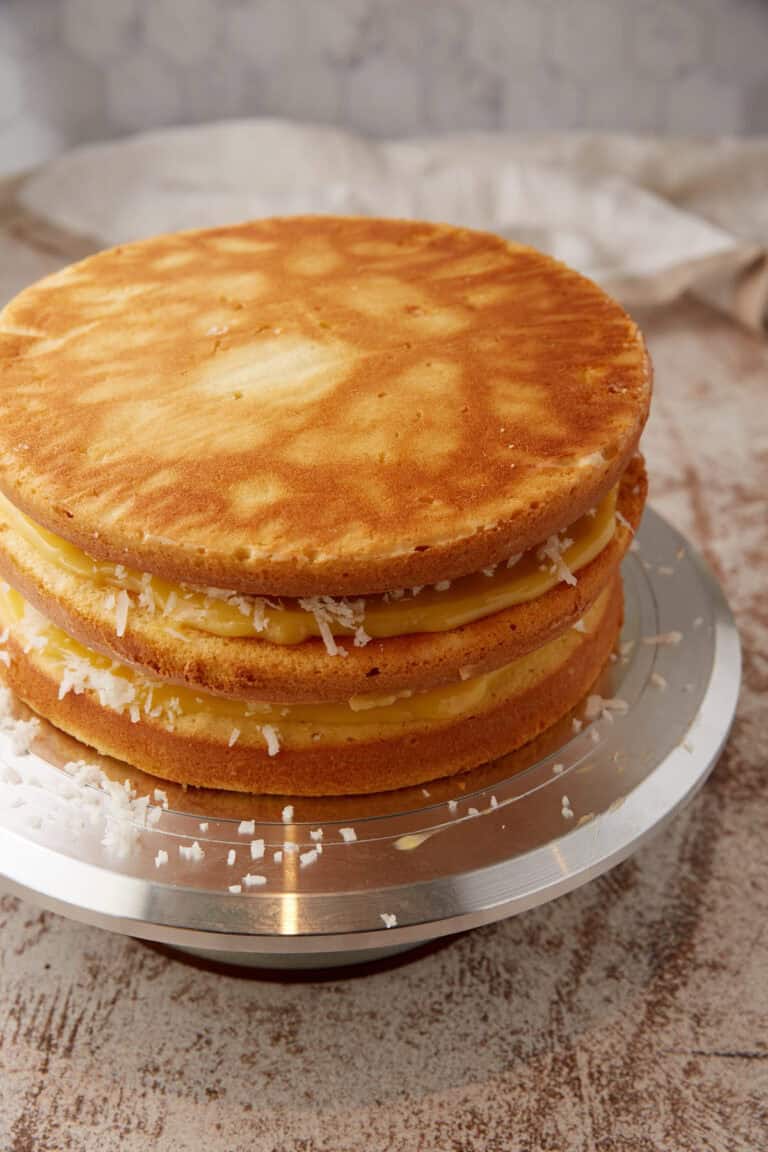 Fluffy Coconut Cake with Lemon Curd Filling - Easy Southern Desserts